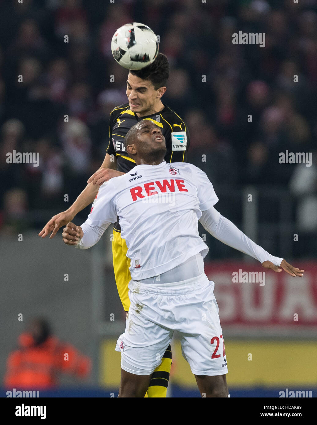 Cologne, Germany. 10th Dec, 2016. Dortmund's Marc Bartra and Cologne's ...