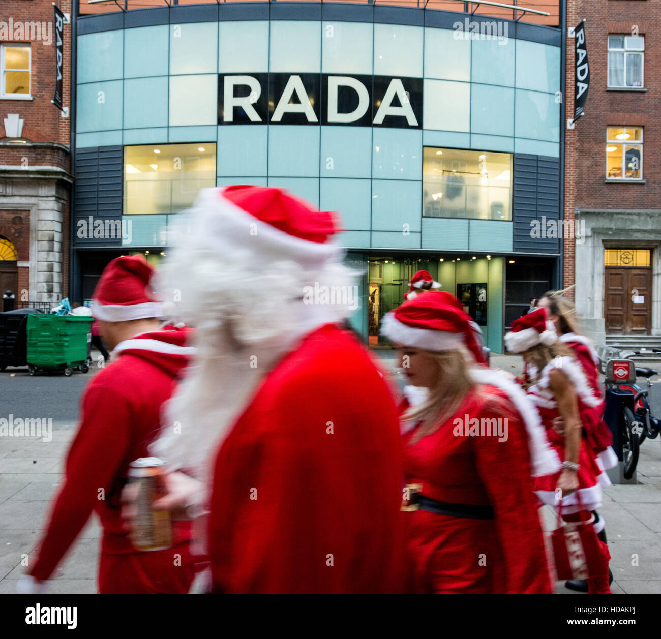 London, England, UK. 10 December 2016. Santacon Santas on the streets ...
