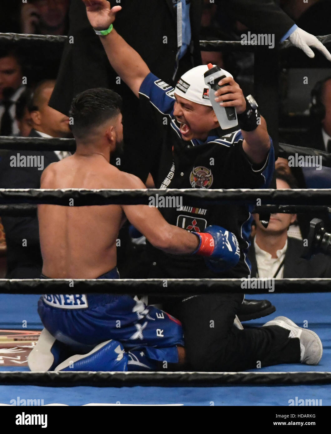 Abner Mares gets a bug hug fro his trainer Robert Garcia after 12 ...