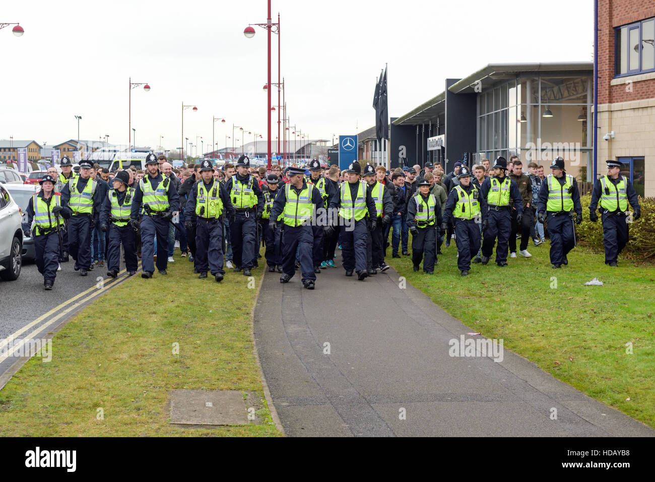 Police escort football fans hi-res stock photography and images - Alamy