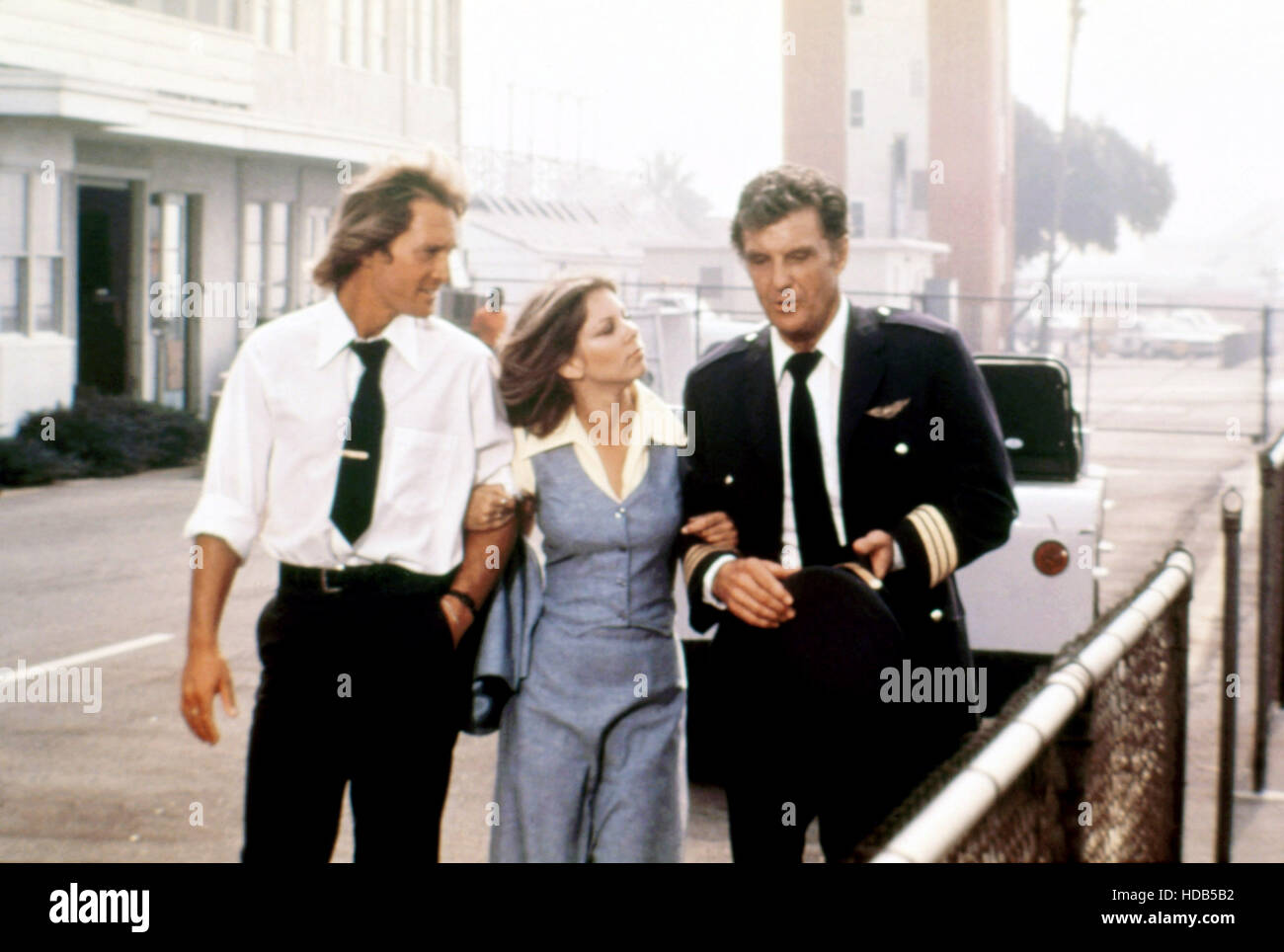 MOST WANTED, (from left): Shelly Novack, Jo Ann Harris, Robert Stack, 1976-77 Stock Photo - Alamy