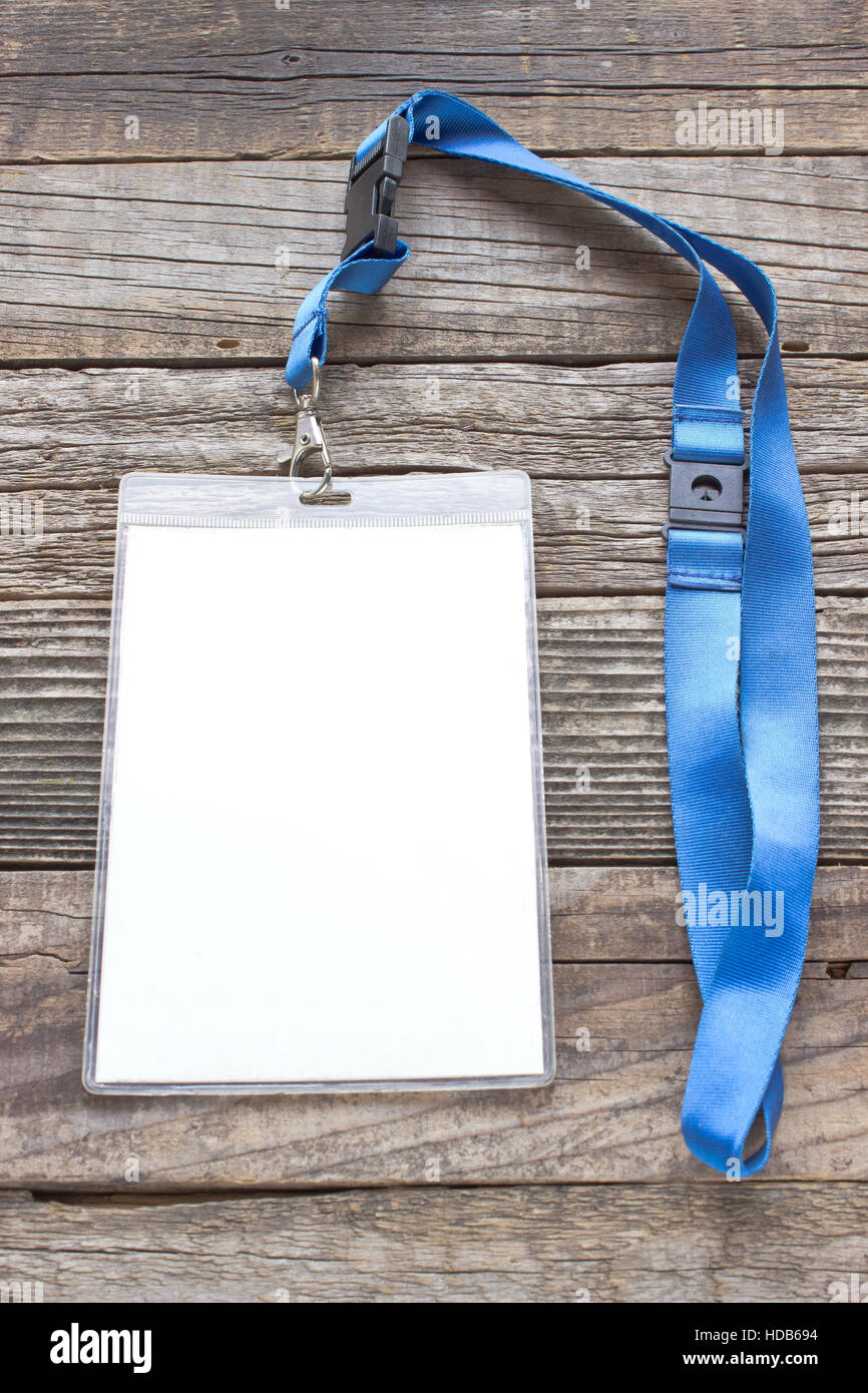 Blank ID card tag on wooden background Stock Photo - Alamy