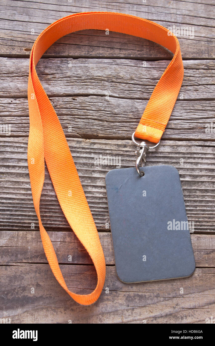 Blank ID card tag on wooden background Stock Photo - Alamy