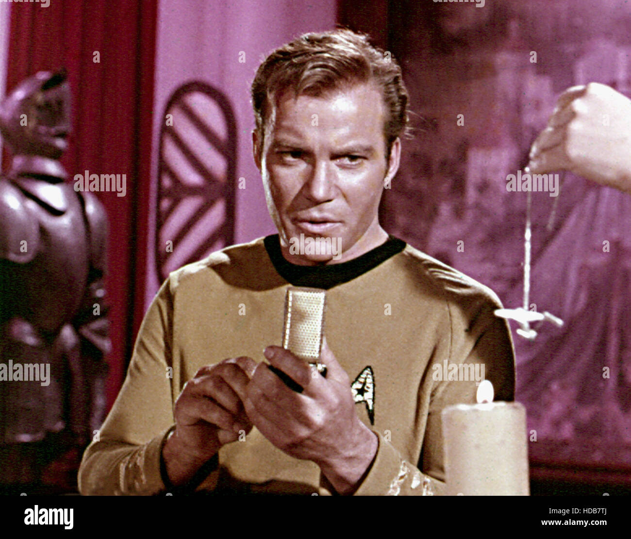 STAR TREK, 1966-69, William Shatner, using a communicator to contact ...