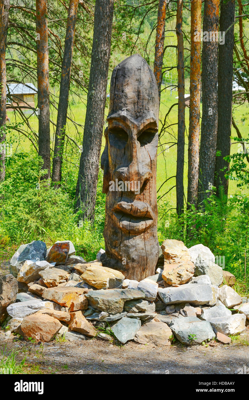 A wooden statue of a pagan deity in the Park Stock Photo - Alamy