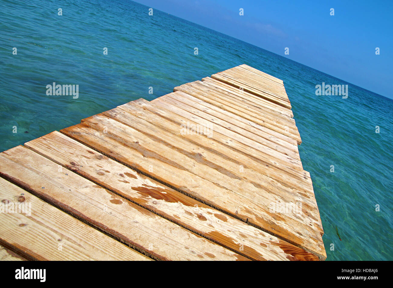 Under the blue sky , platform pier wood beside sea Stock Photo - Alamy