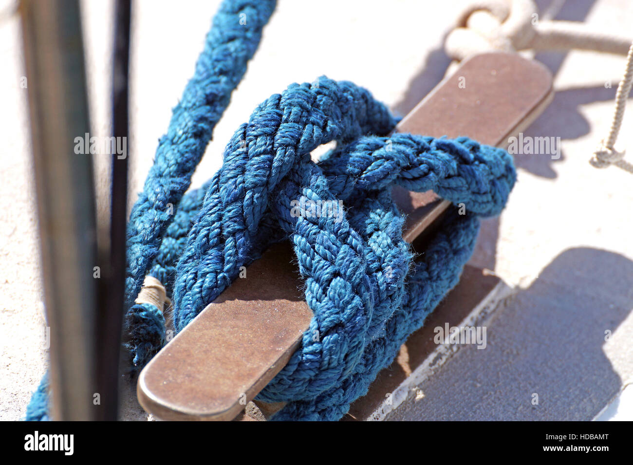 bollard with rope on the pier Stock Photo - Alamy