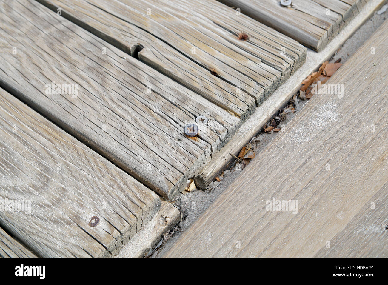 Wooden beach boardwalk with sand for texture or background Stock Photo ...