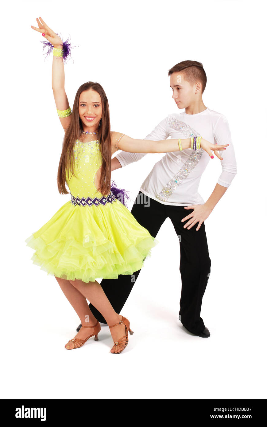 Boy and girl dancing ballroom dance on white background Stock Photo - Alamy