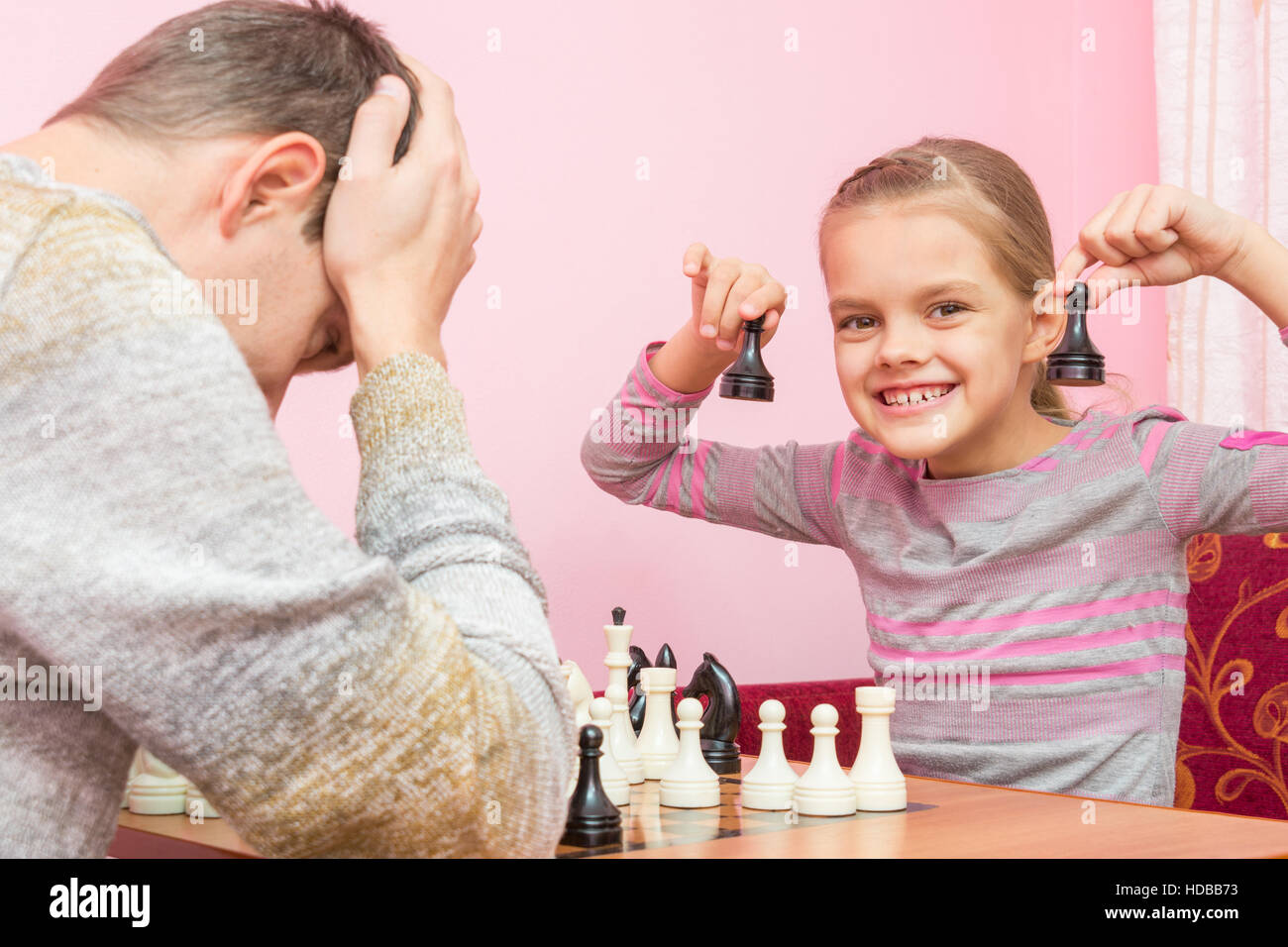 Two children playing chess hi-res stock photography and images - Alamy