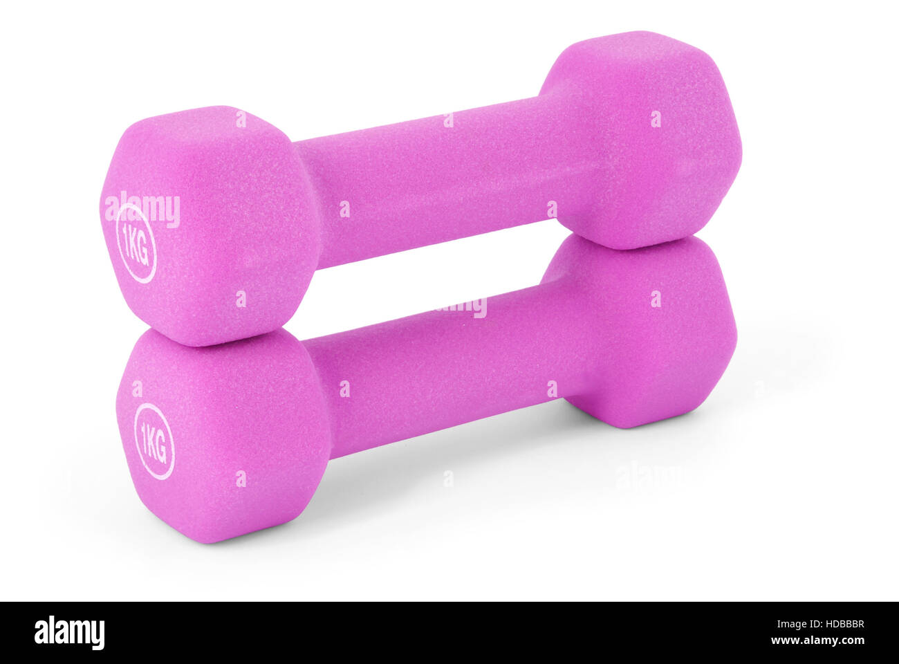 pink dumbbells in hand. Isolated on white background with soft shadow ...