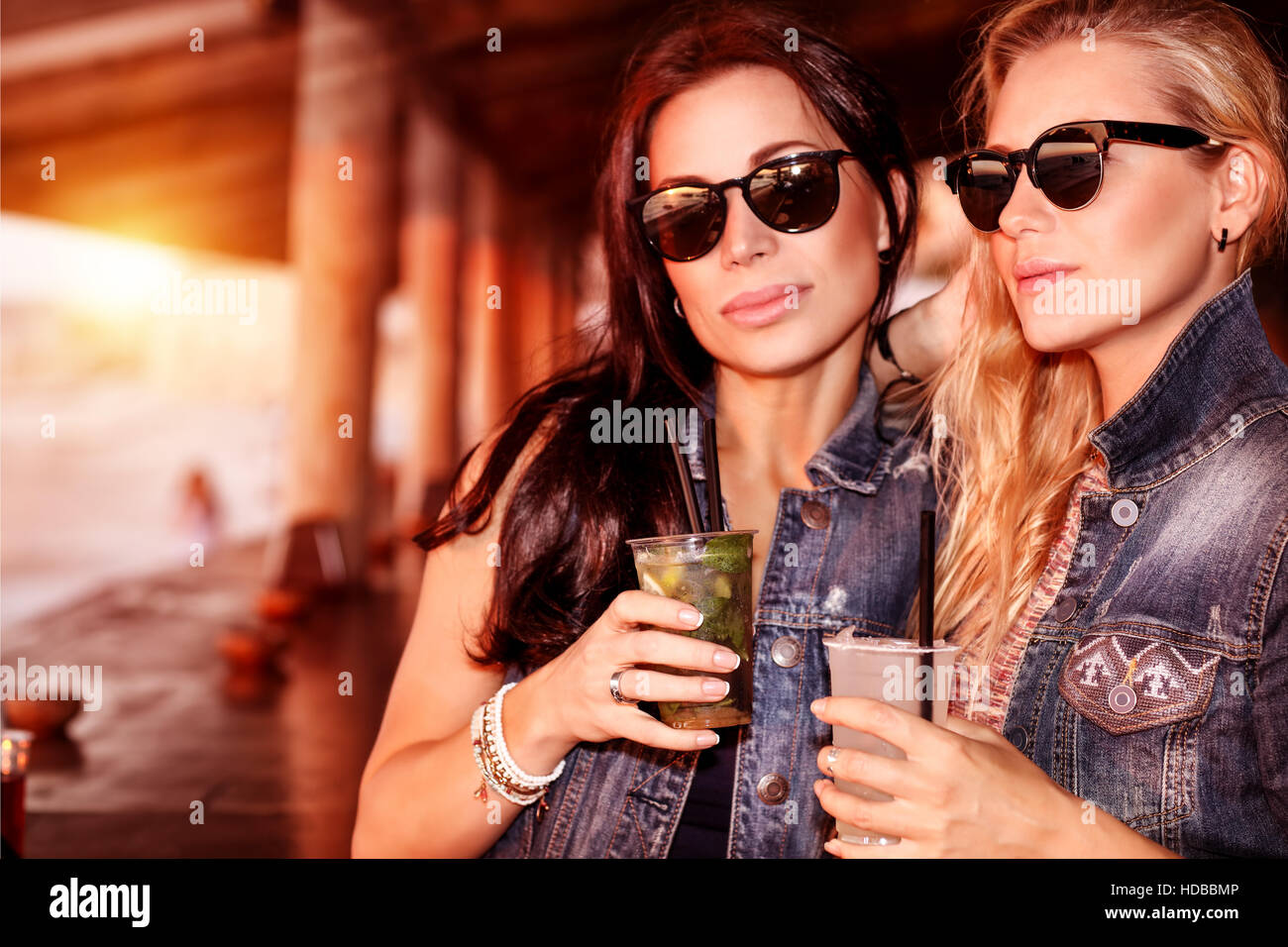 Two girls having drink pub hi-res stock photography and images - Alamy