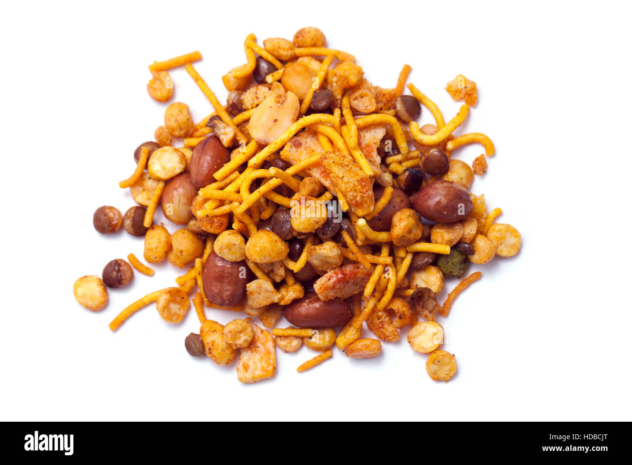 Pile of dry roasted Indian snack mix, isolated over white Stock Photo ...