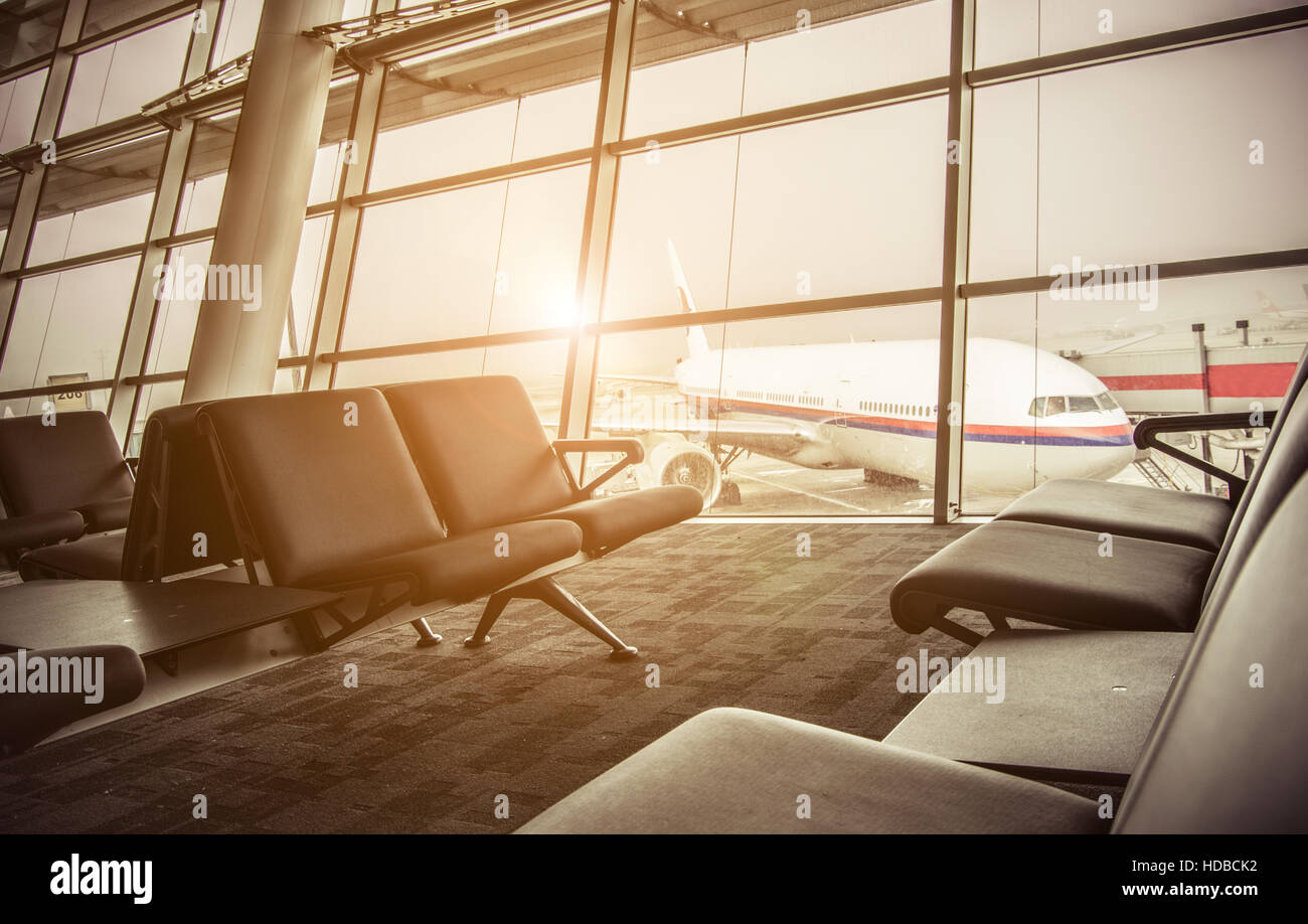 Airport terminal and airplane Stock Photo - Alamy