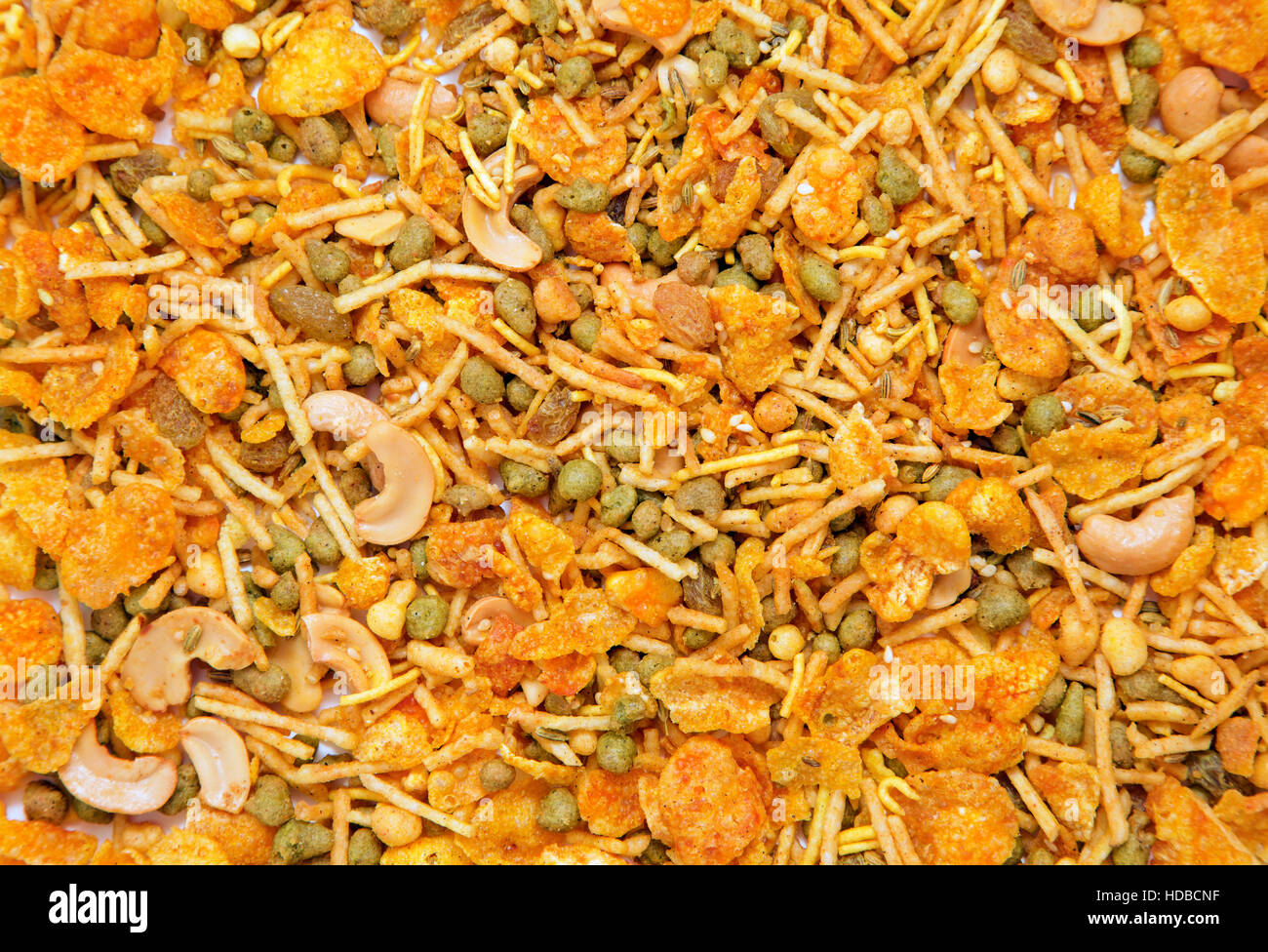 Dry roasted Indian snack mix, close-up background Stock Photo - Alamy