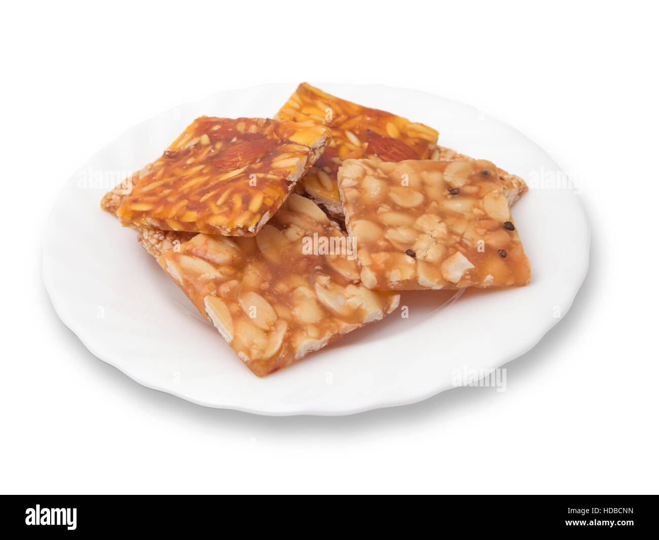 Various kinds of Indian sweet brittle on a plate Stock Photo - Alamy