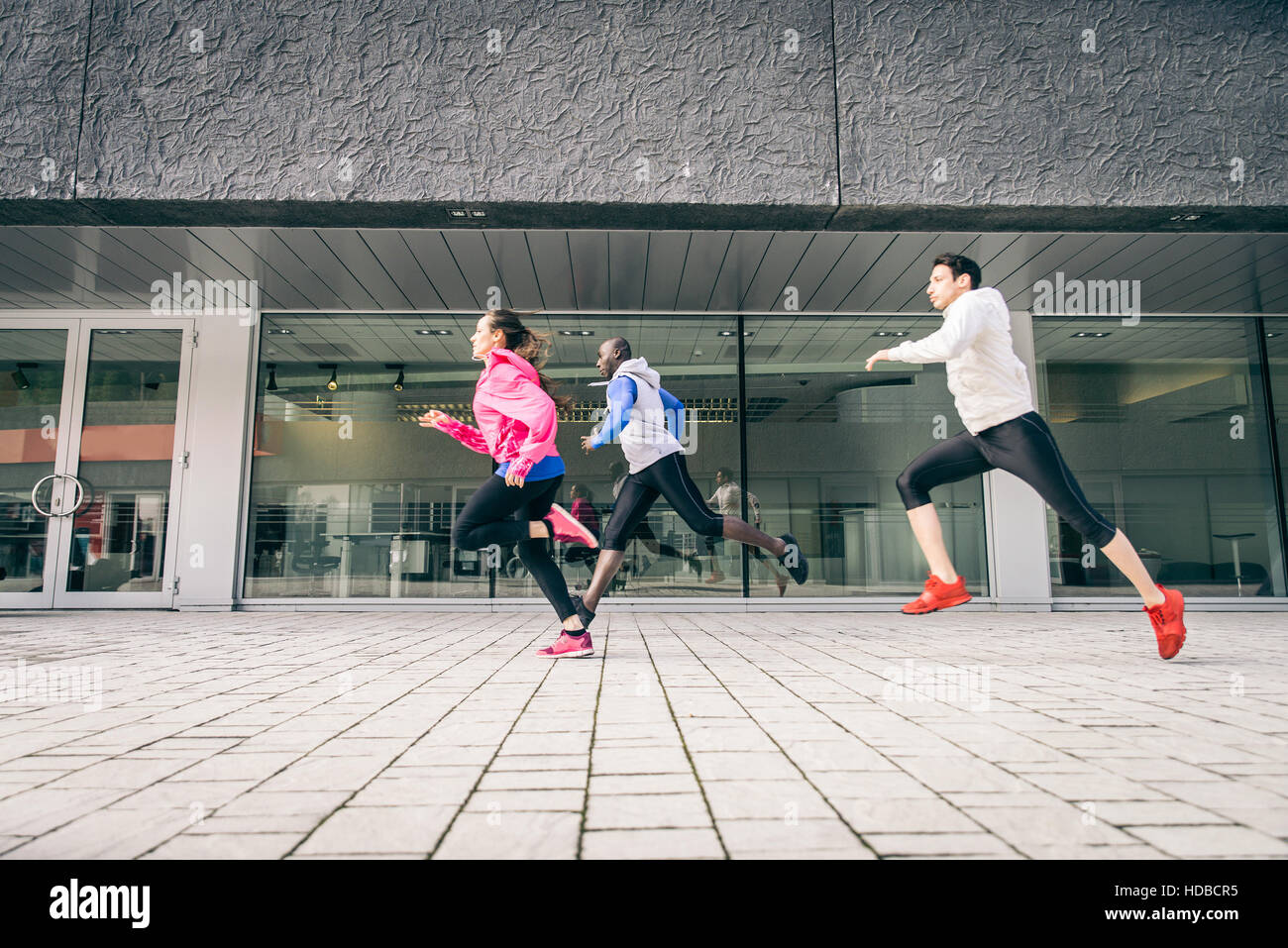 Three men running in marathon hi-res stock photography and images - Alamy