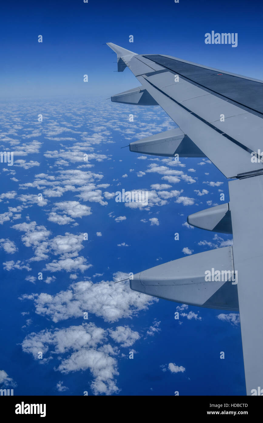 View of a plane wing from inside an airplane Stock Photo - Alamy