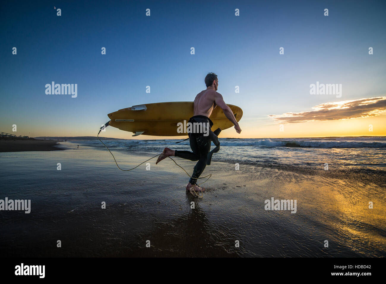 Young surfer with malibu board hi-res stock photography and images - Alamy