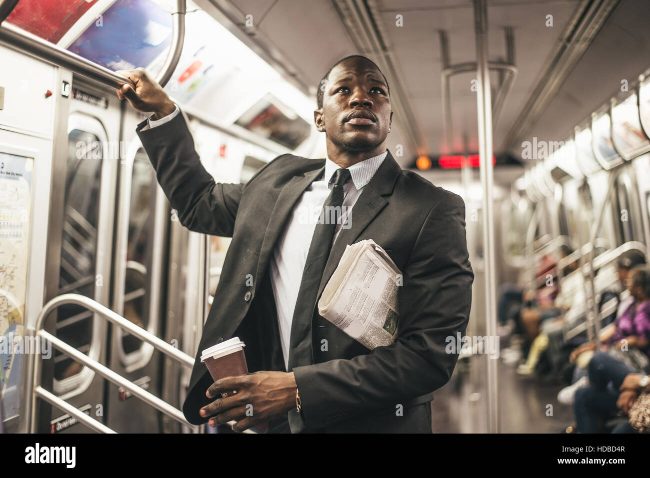 Businessman in full suit in New York subway metro Stock Photo - Alamy