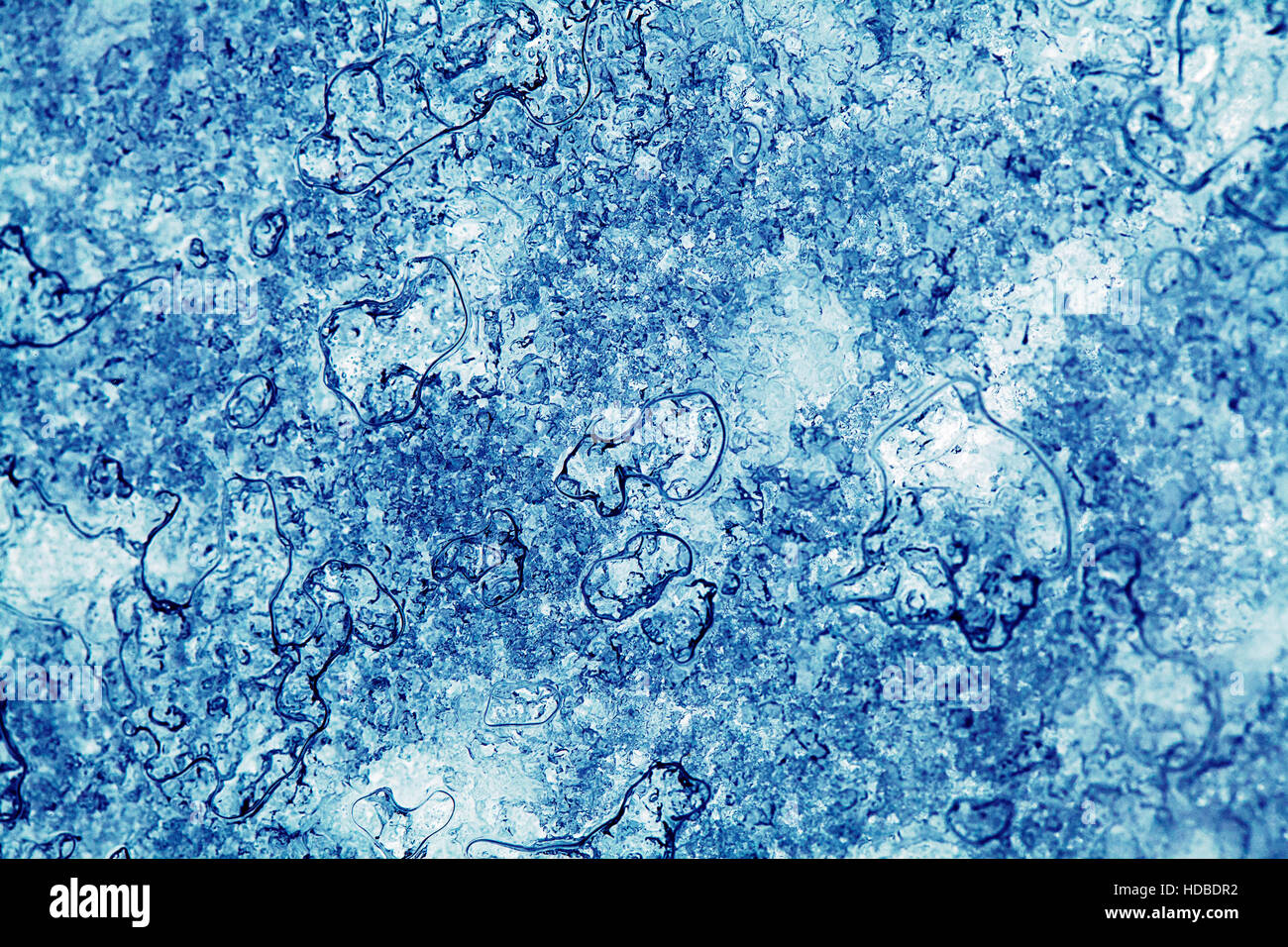 Block of blue smooth melting ice, close-up Stock Photo - Alamy