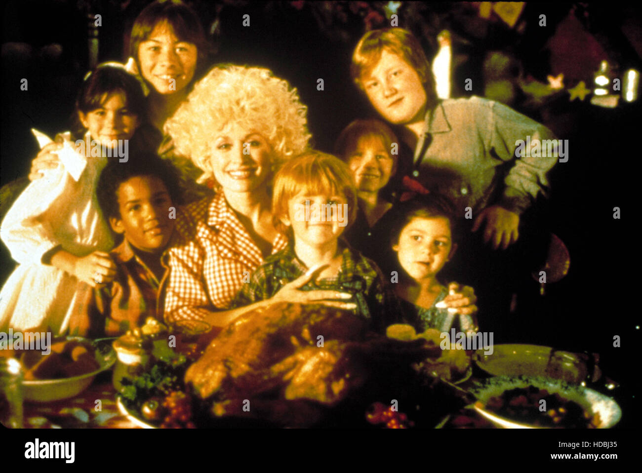 A SMOKY MOUNTAIN CHRISTMAS, (ctr) Dolly Parton (r-l)Gennie James, Daryl ...