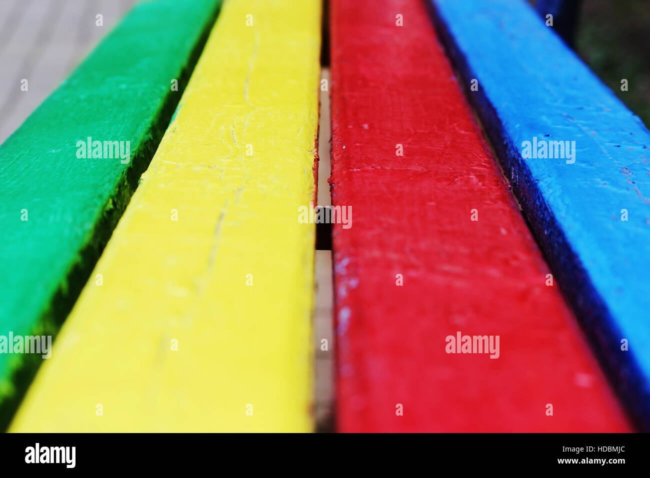 Colorful design park bench on the street Stock Photo - Alamy