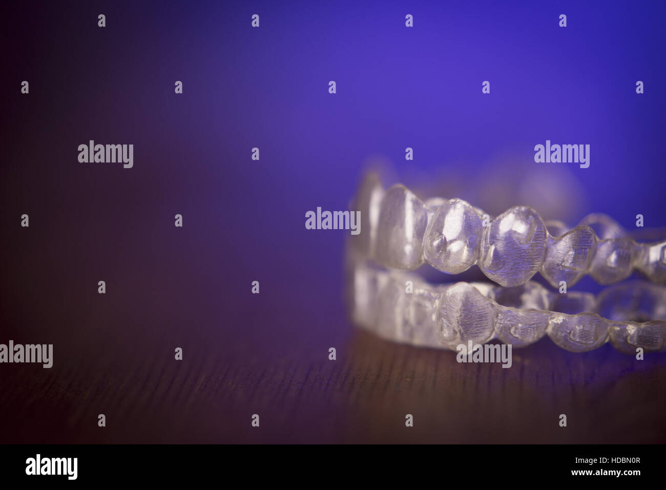 Transparent dental orthodontics for adults and children Stock Photo - Alamy