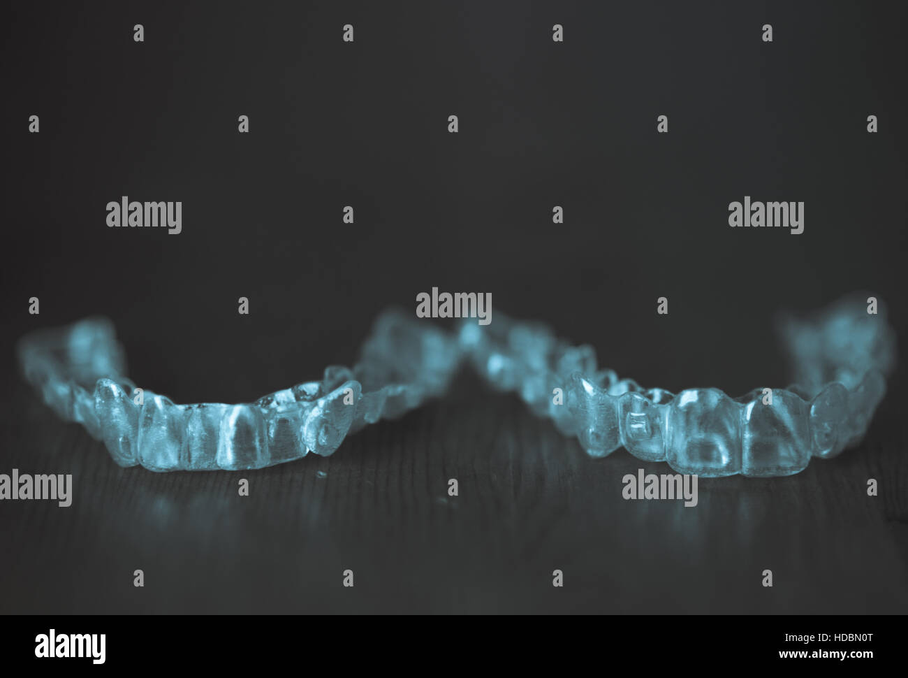 Transparent dental orthodontics for adults and children Stock Photo - Alamy