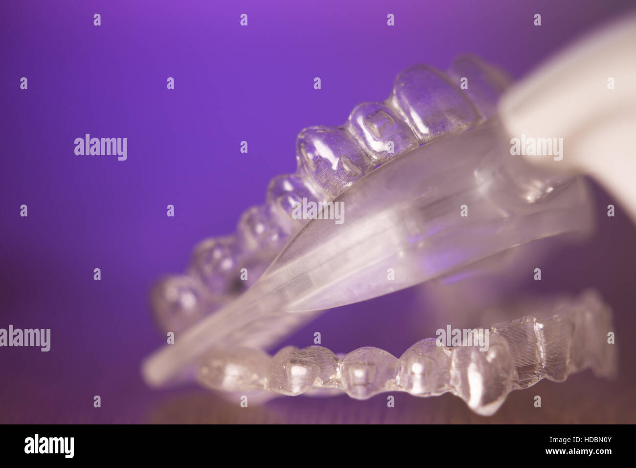 Vibrating dental device with invisible orthodontics Stock Photo - Alamy