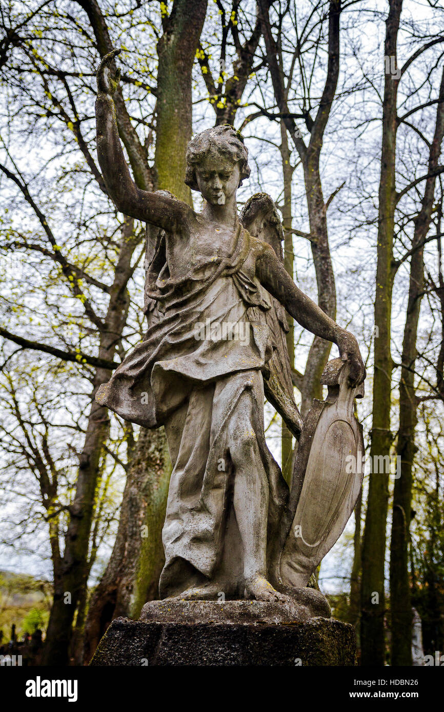 Old statue of an angel at Vilnius cemetery Stock Photo - Alamy