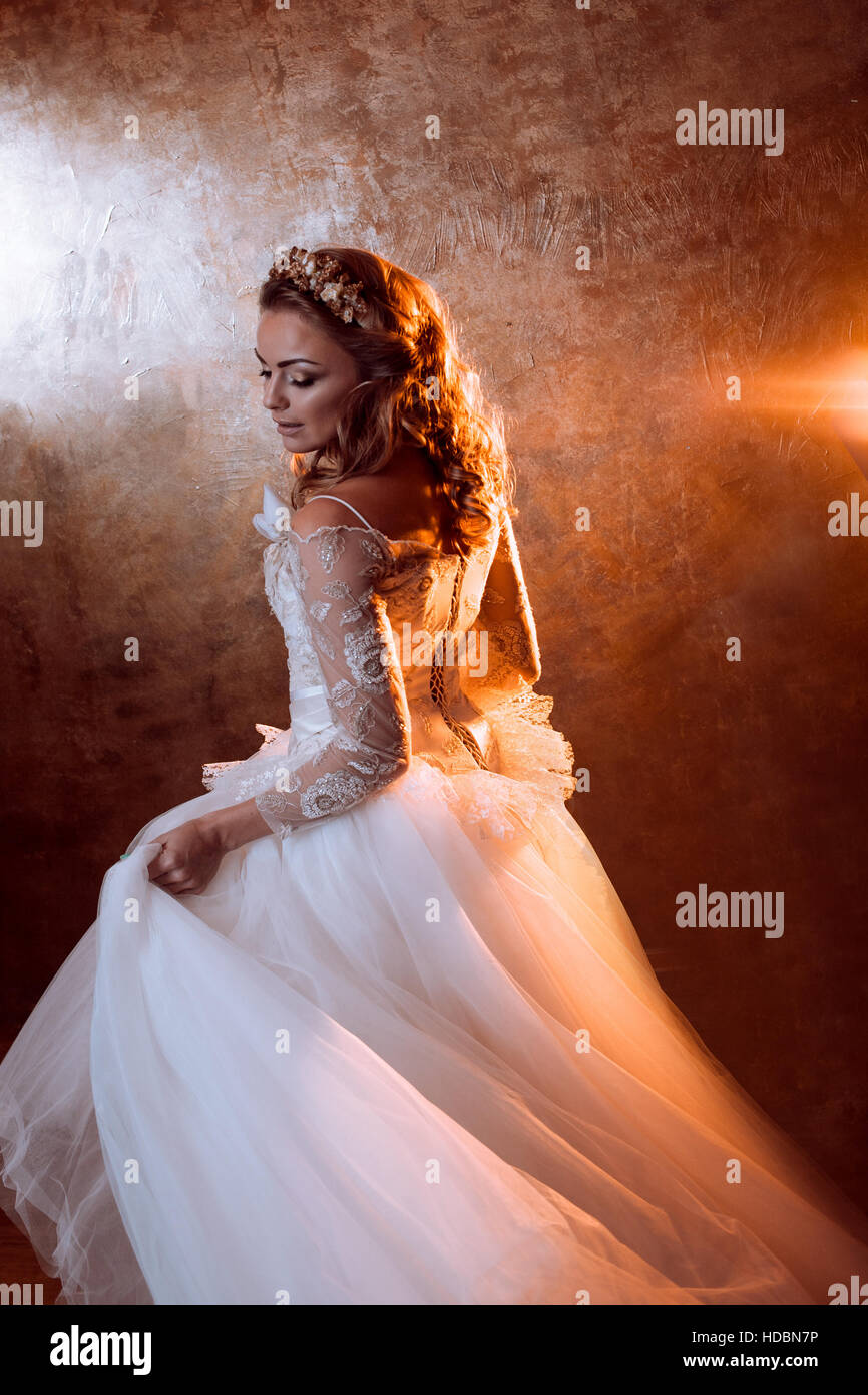 Beautiful girl bride in luxurious wedding dress, portrait in Golden ...