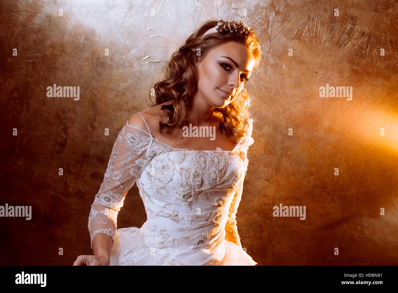 Beautiful girl bride in luxurious wedding dress, portrait in Golden ...