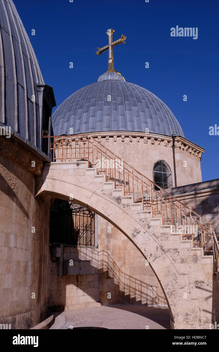 Cross over the silver gray dome of Church of Holy Sepulchre in the ...