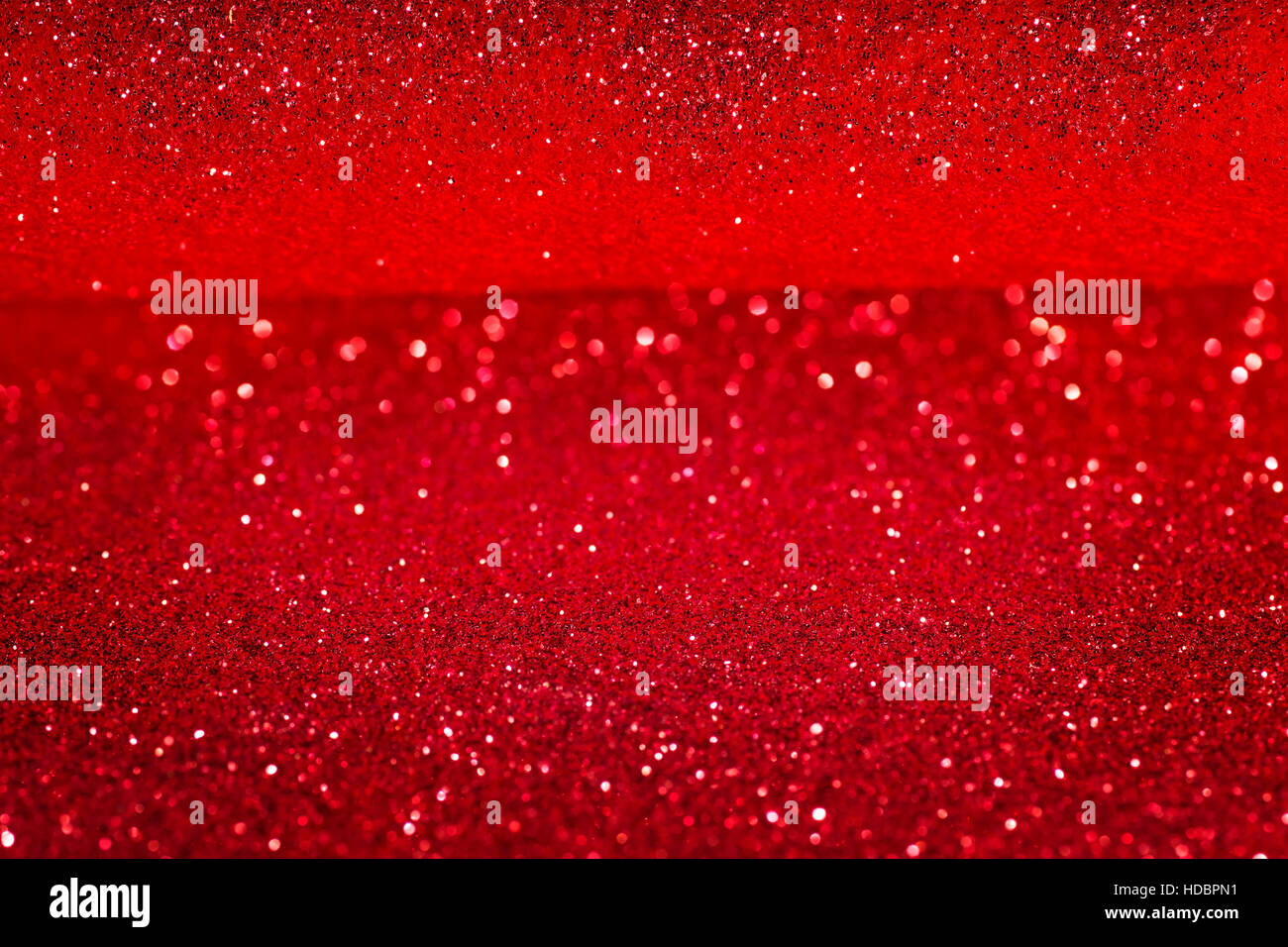 Red glittered surface. Texture and background Stock Photo - Alamy