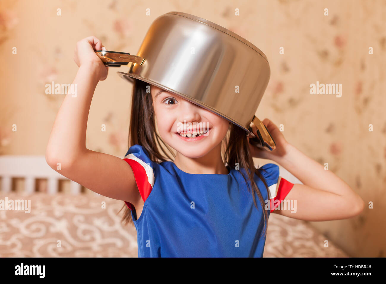Girl With Pan On Head High Resolution Stock Photography and Images - Alamy