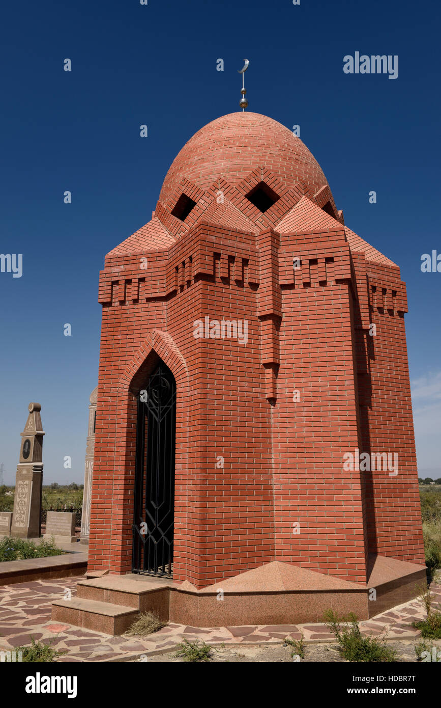 Red Brick mausoleum at Roadside Muslim cemetery near Shelek Kazakhstan ...