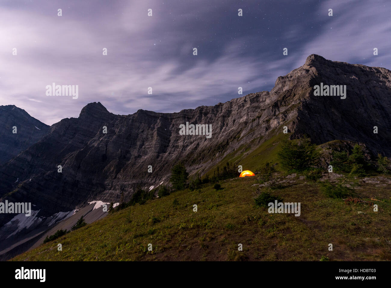 Illuminated tent camping on ridgeline of mountain Stock Photo - Alamy