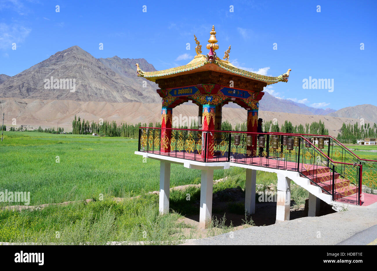 A picturesque view of a traditional Buddhist structure with beautiful ...