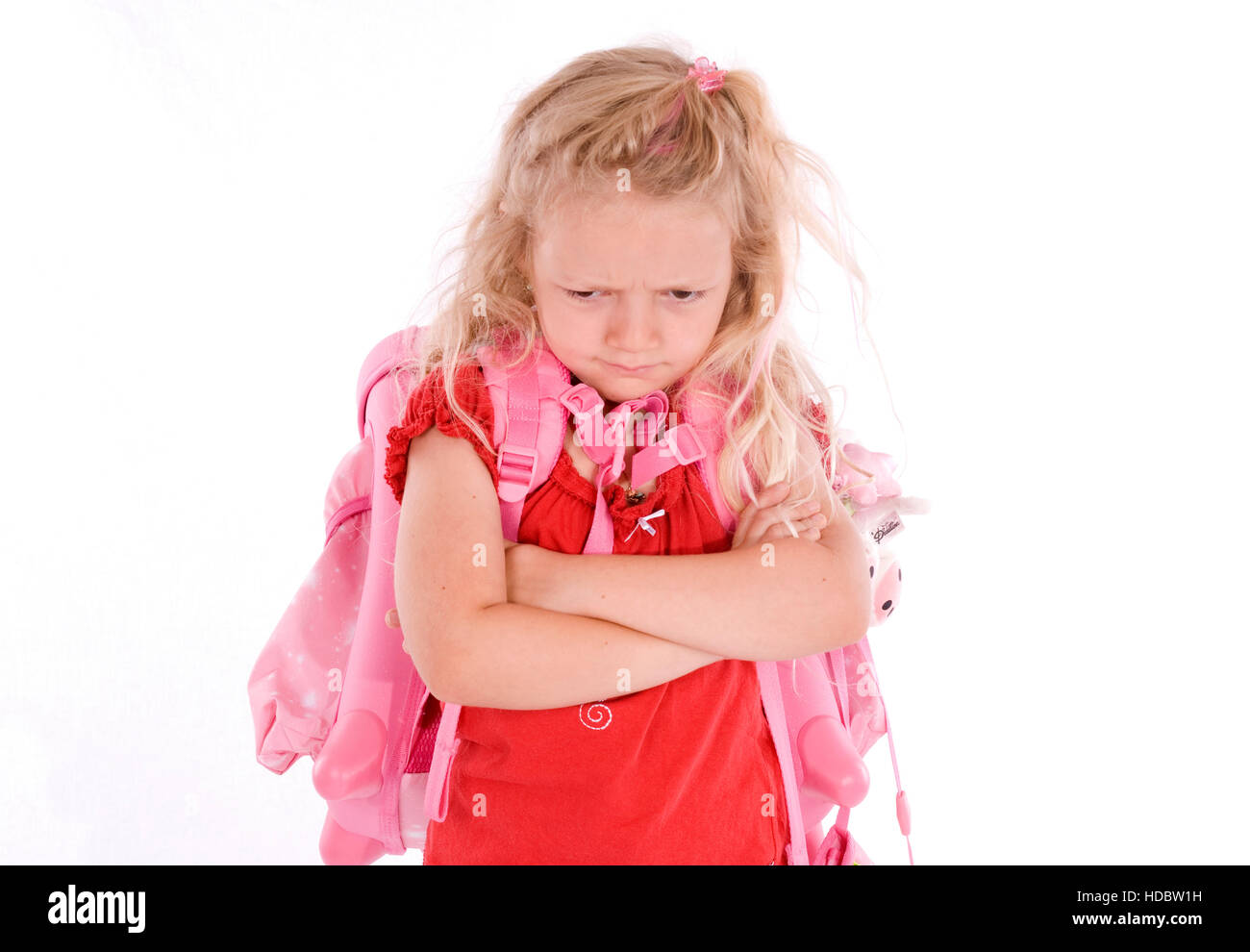 Schoolgirl giving an evil look Stock Photo - Alamy