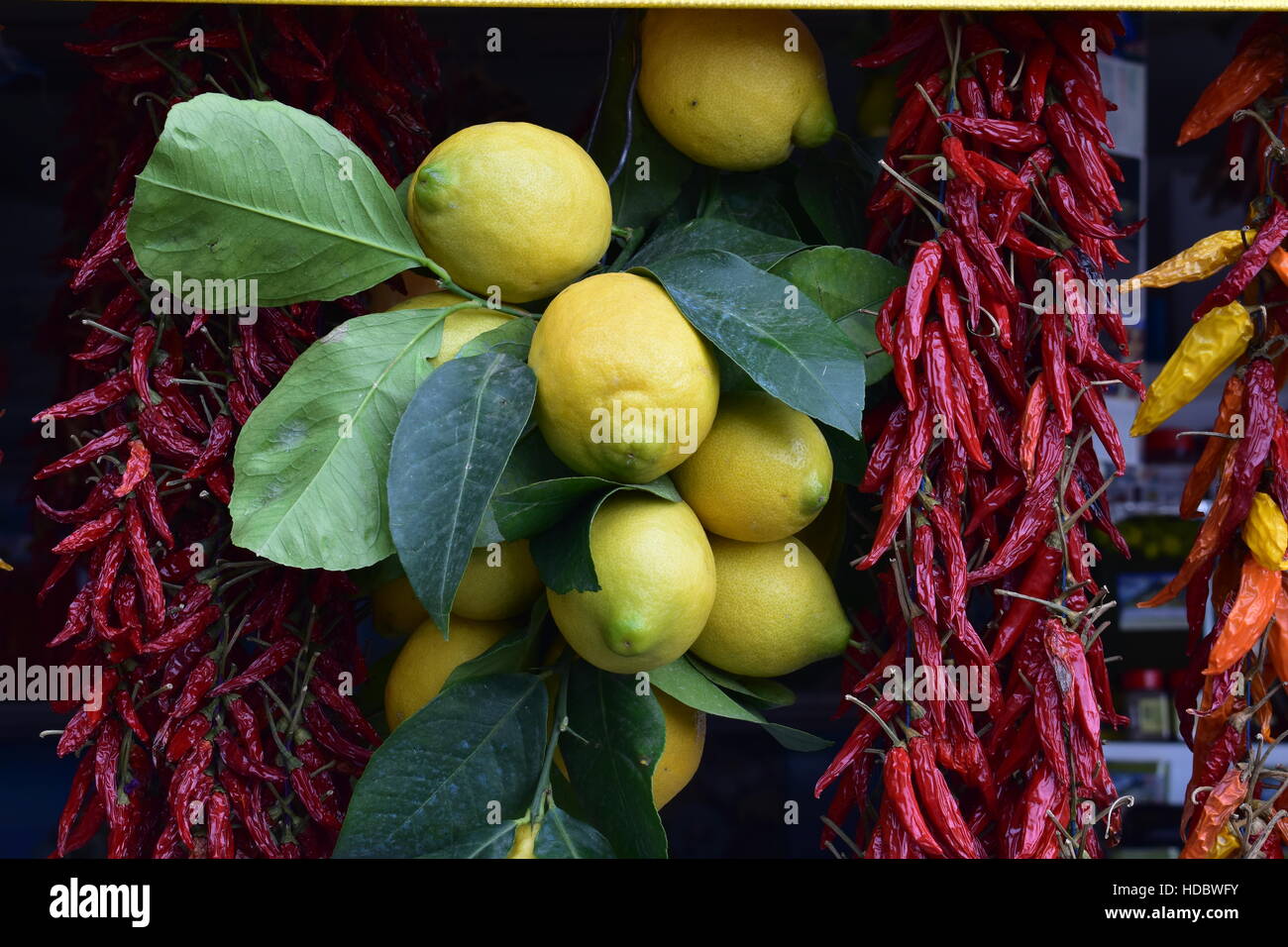 Lemons and chilli peppers Stock Photo - Alamy