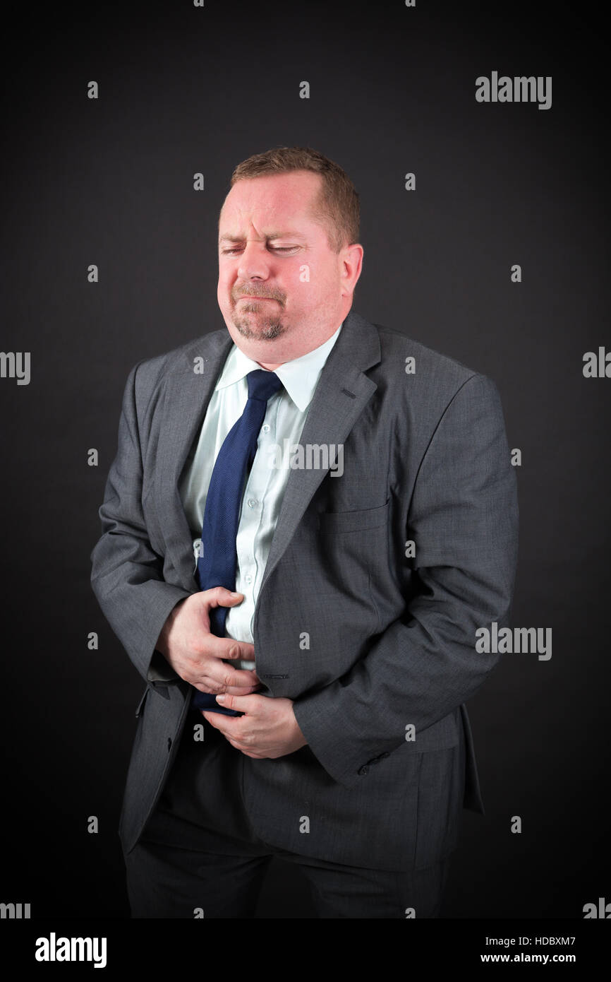 Slightly Overweight Man In Suit