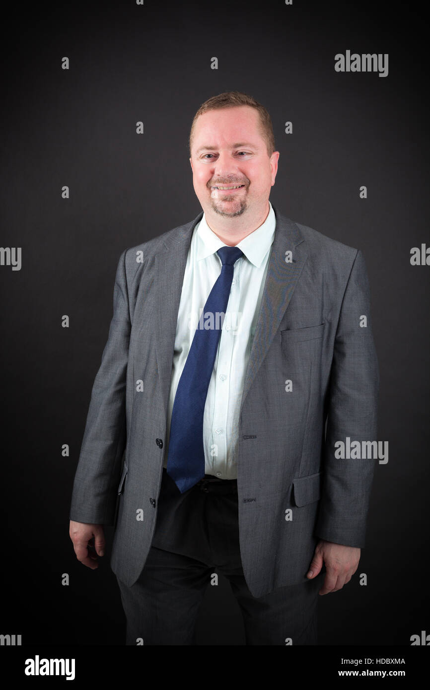 Handsome man doing different expressions in different sets of clothes ...