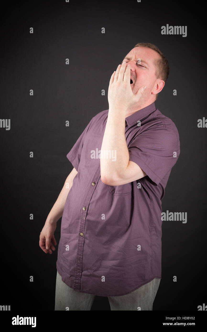 Fat person yawning hi-res stock photography and images - Alamy