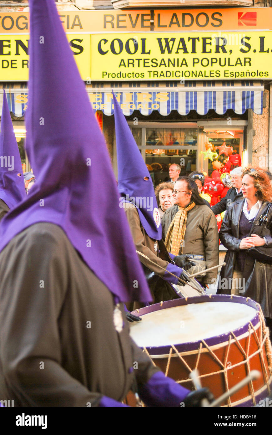 Members of a catholic brotherhood march during a procession in Madrid ...