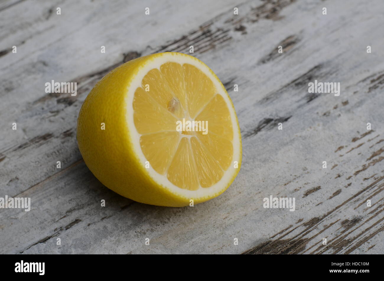 lemons cut open on a cutting board Stock Photo - Alamy