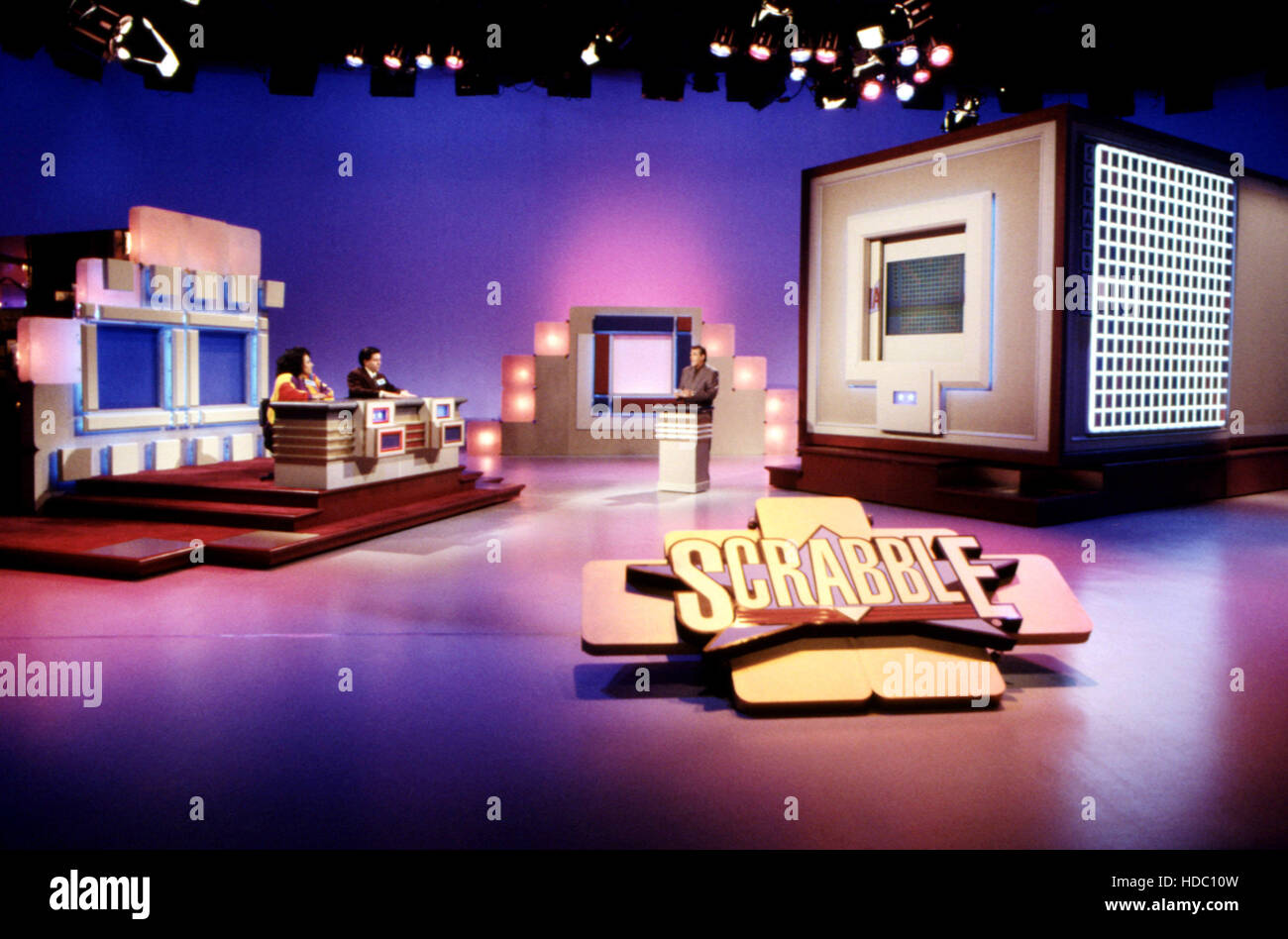 SCRABBLE, (from left): contestants, host Chuck Woolery (right), 1993 ...