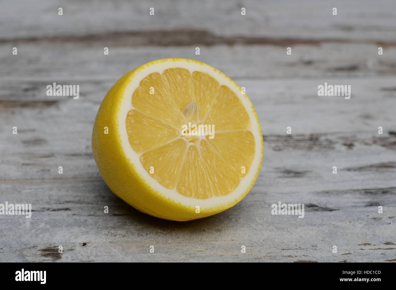lemons cut open on a cutting board Stock Photo - Alamy