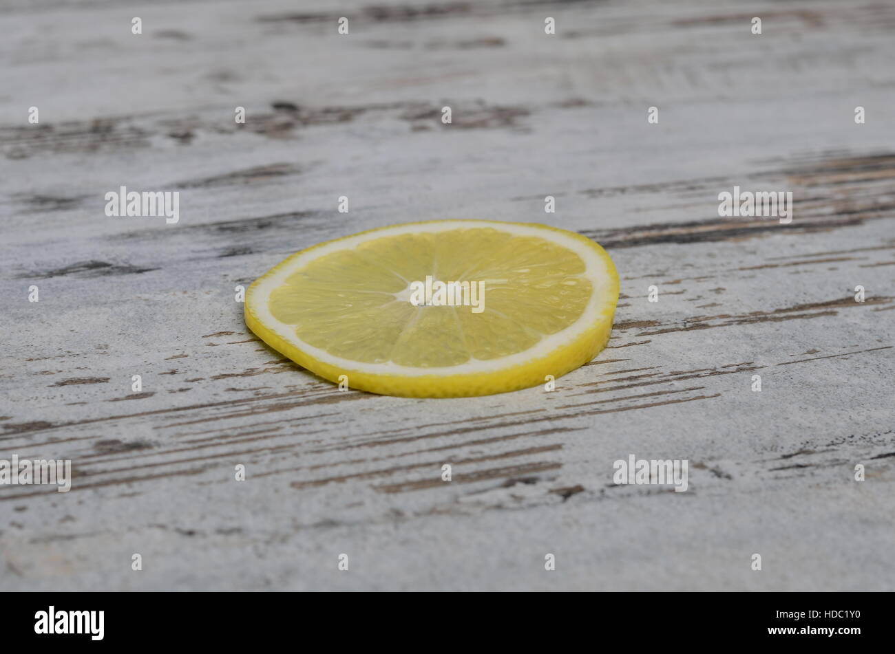 lemons cut open on a cutting board Stock Photo - Alamy