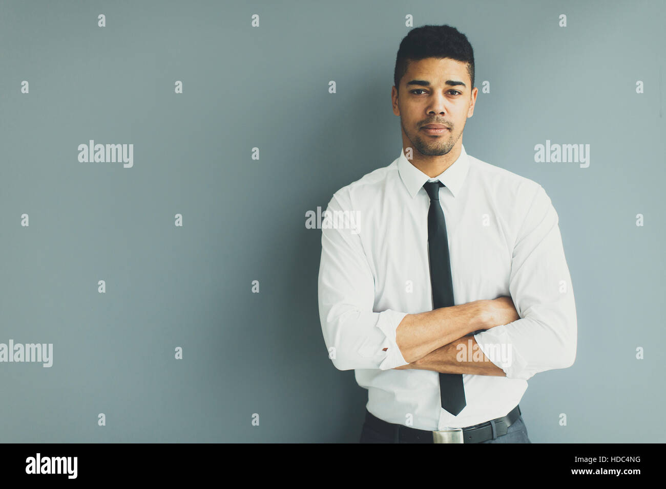 Handsome black man standing hi-res stock photography and images - Alamy
